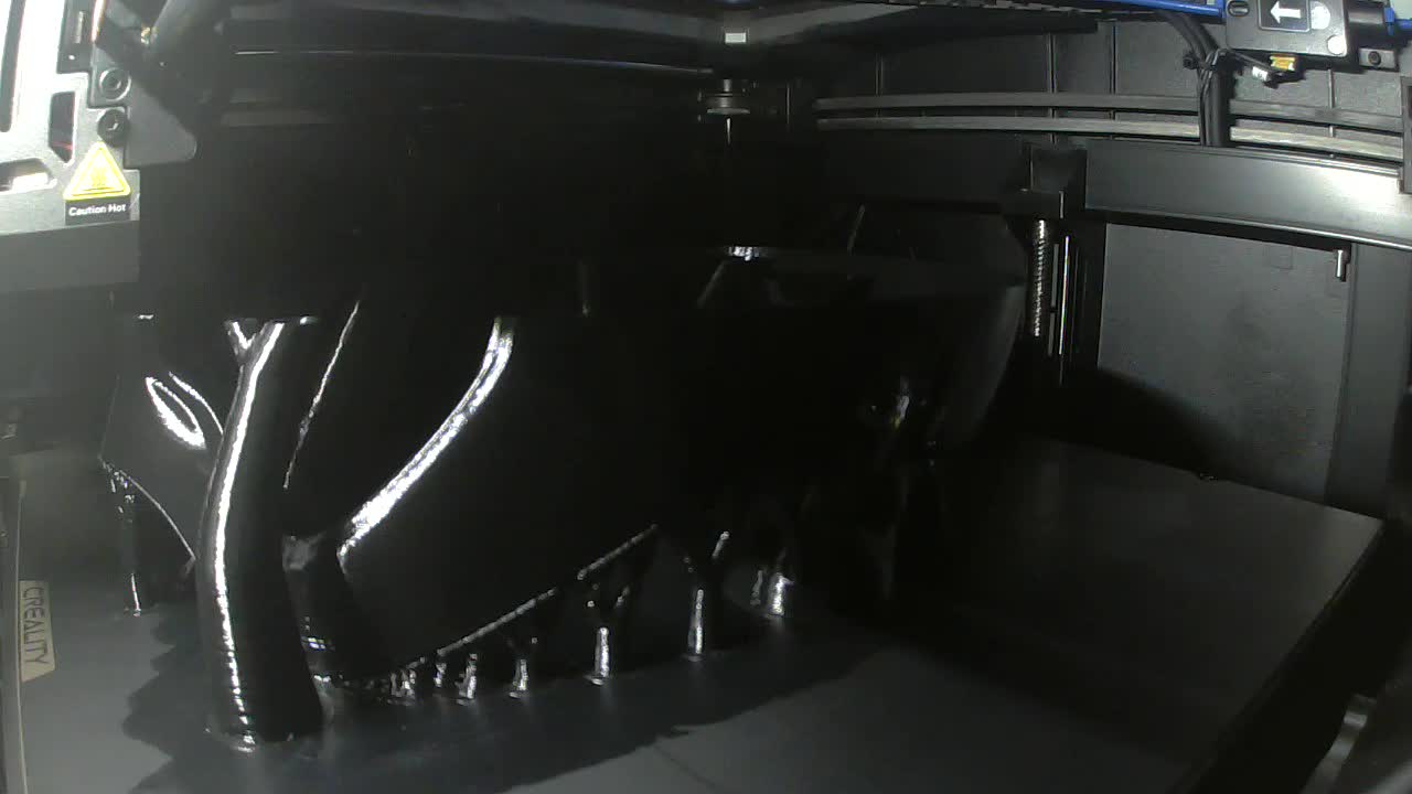 When doing full helmets try the tree support to save filament ...